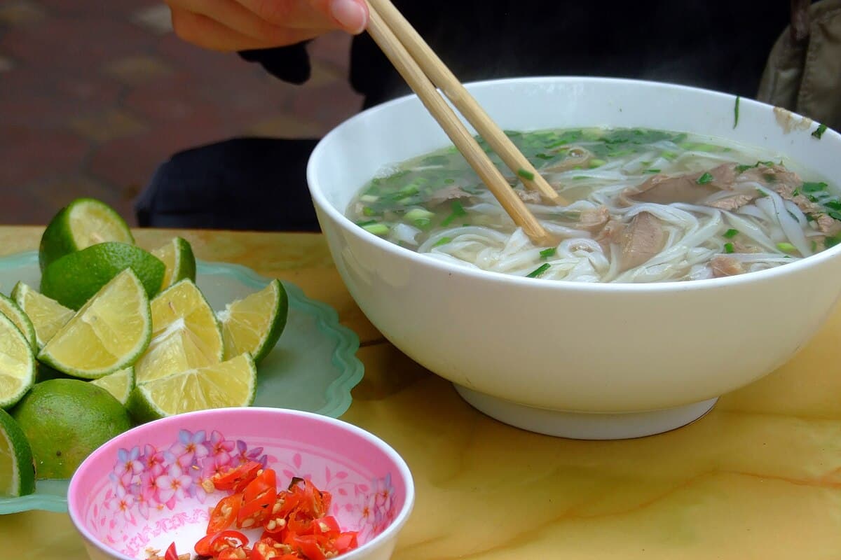 Vietnamese Food Guide: What to Eat City by City (2026) | Day Trips Vietnam